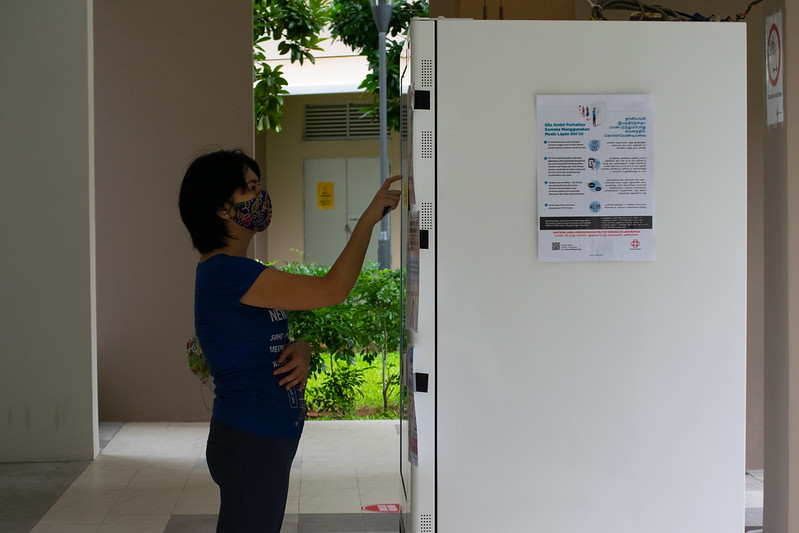 24-hour vending machines distribute masks to help Singapore contain the ...