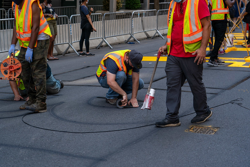 Black Lives Matter painted in front of Trump Towers - Pavement Pieces